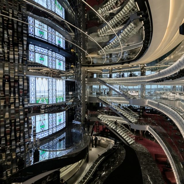 The stunning atrium at the heart of the ship acts as the social hub ...
